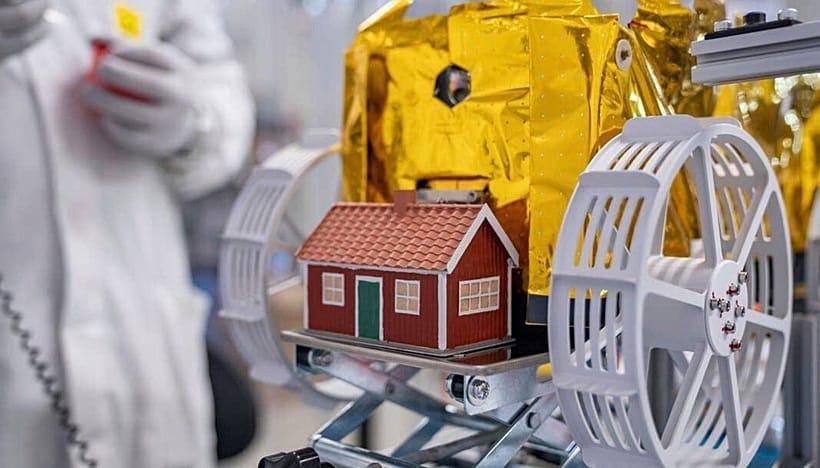 Video. Swedish artist’s dream takes flight: Tiny red house heads to the ...