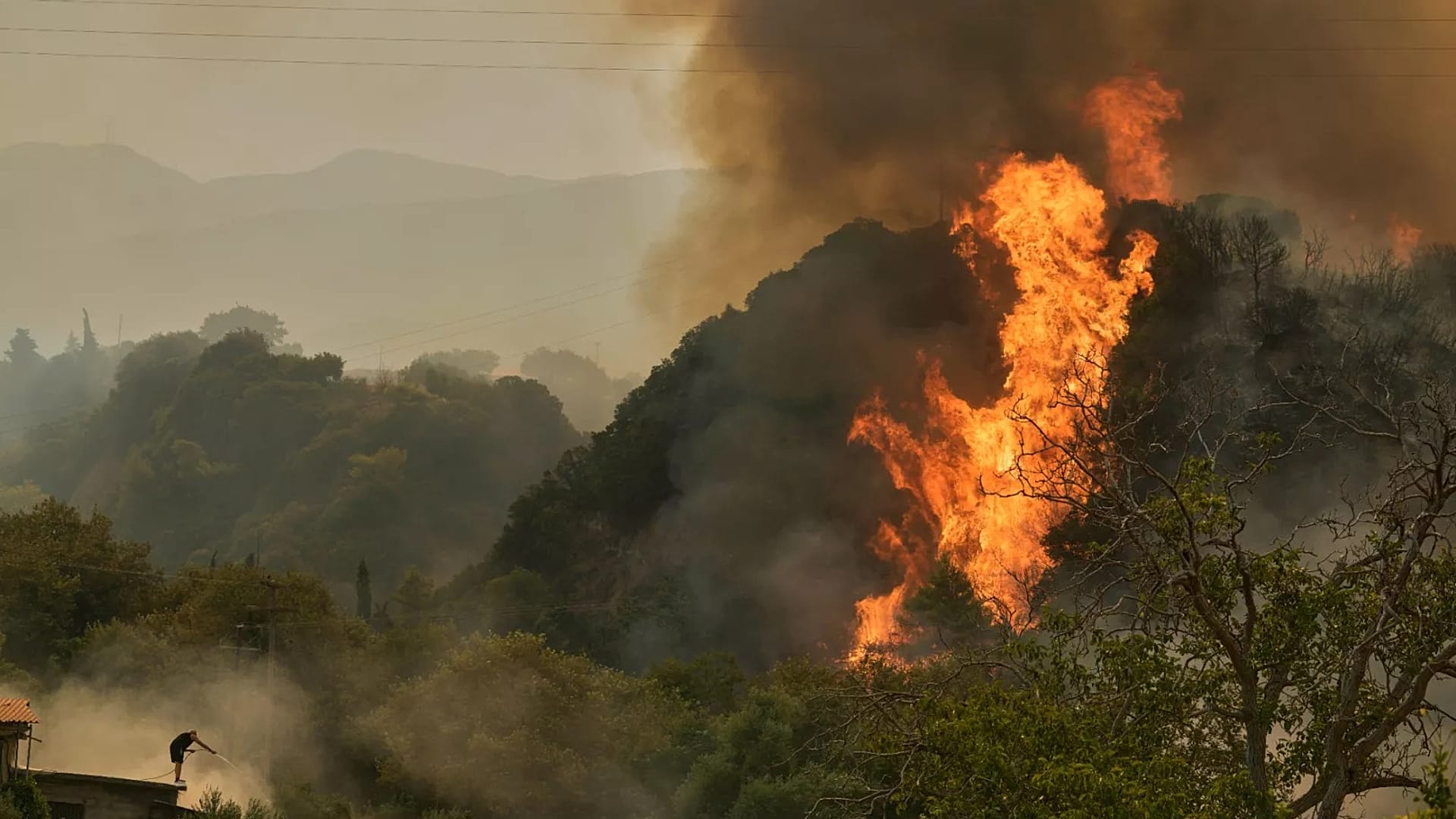 At least three killed as European wildfires threaten the evacuation of ...