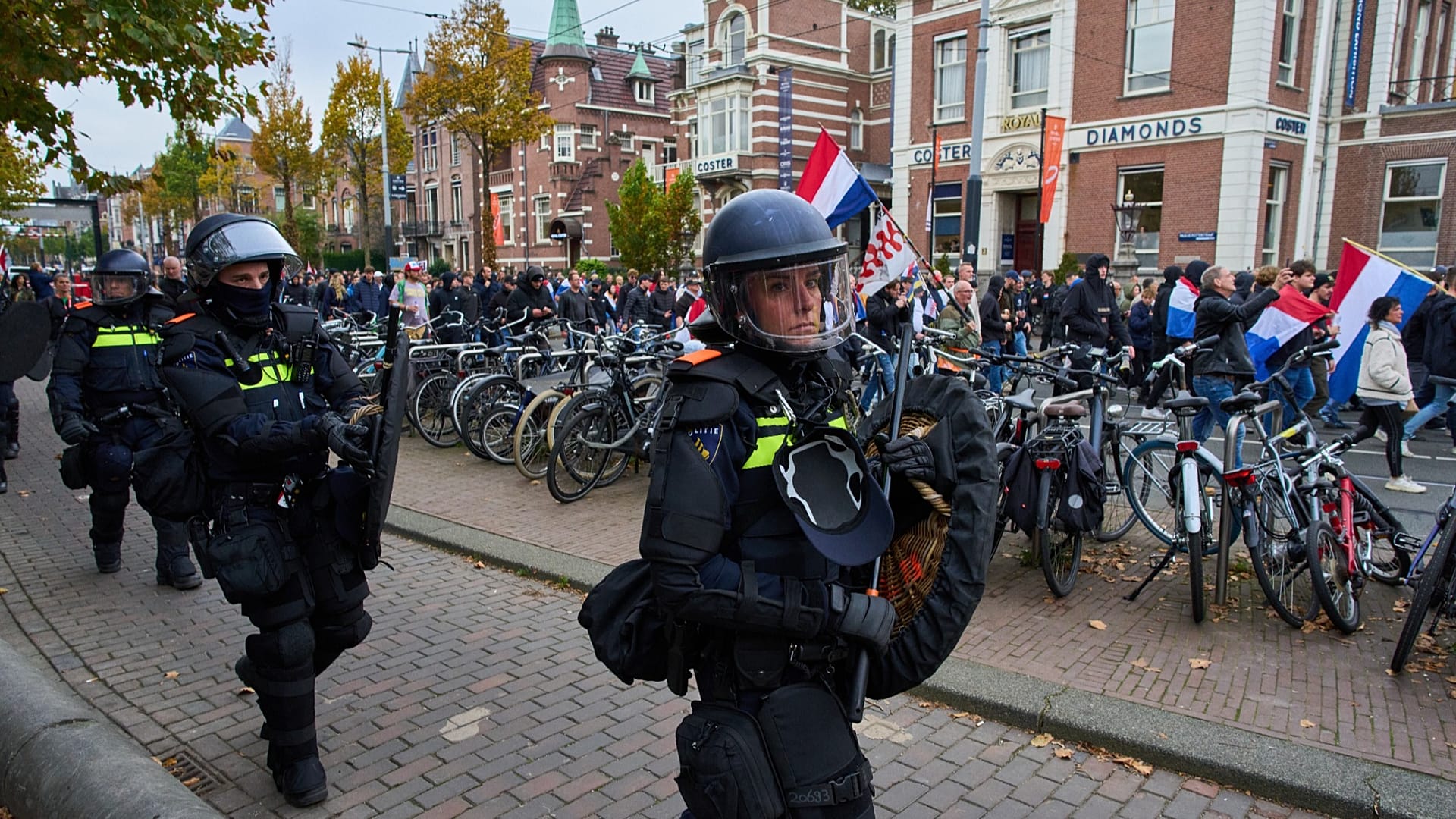 Dozens arrested after anti-immigration protest in Amsterdam escalates ...