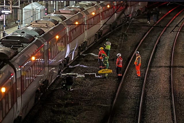 Two British nationals arrested on suspicion of murder in train stabbing ...