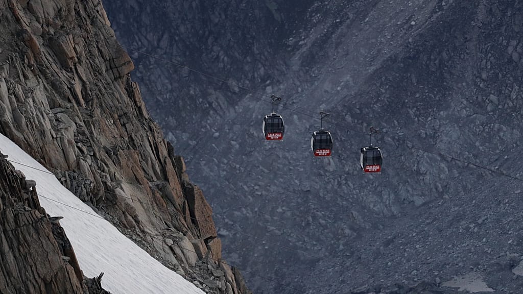 At least six people injured and 100 evacuated after Italy cable car ...