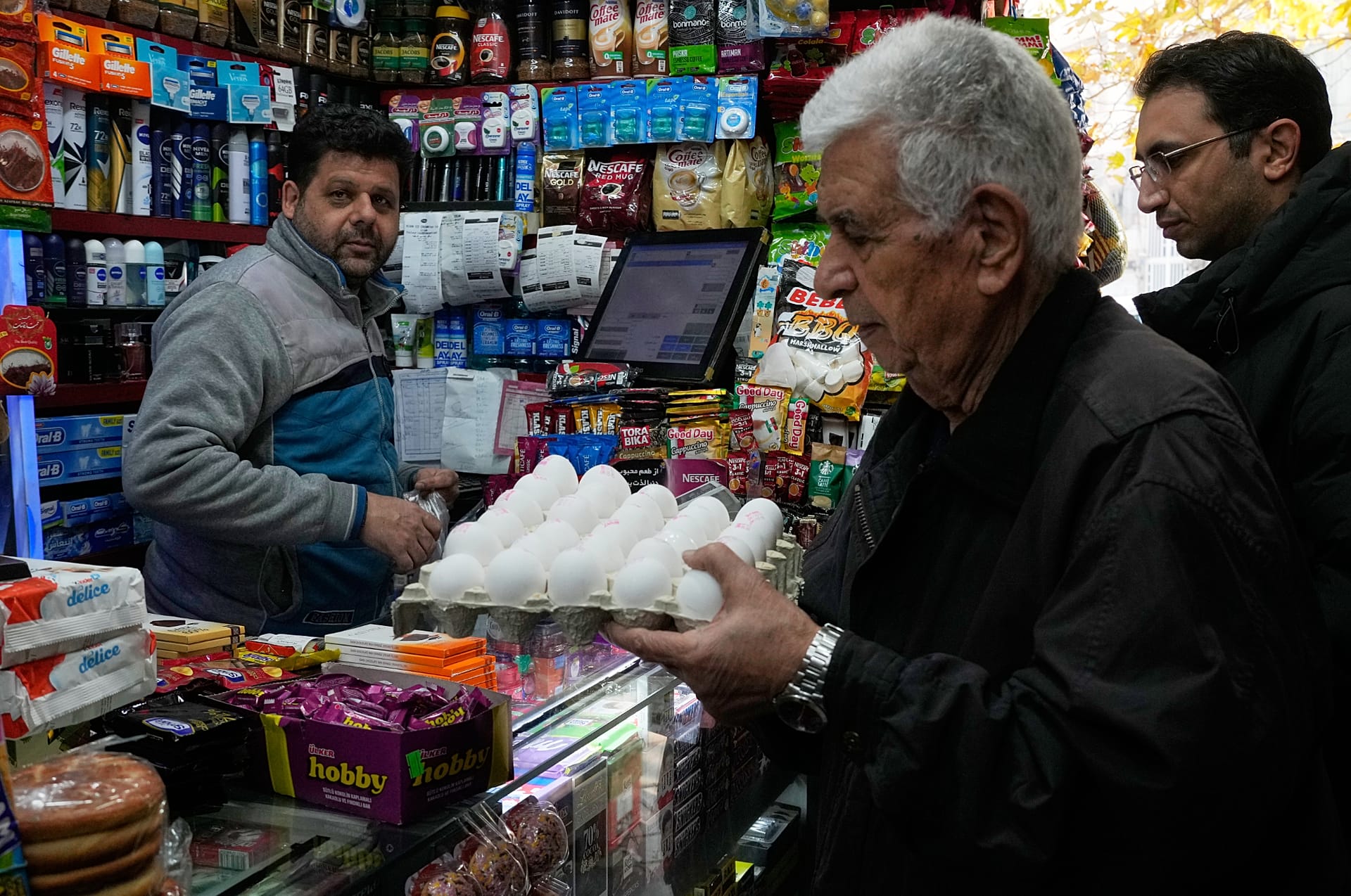 Security forces clash with protesters in Iran's main bazaar as 36 ...