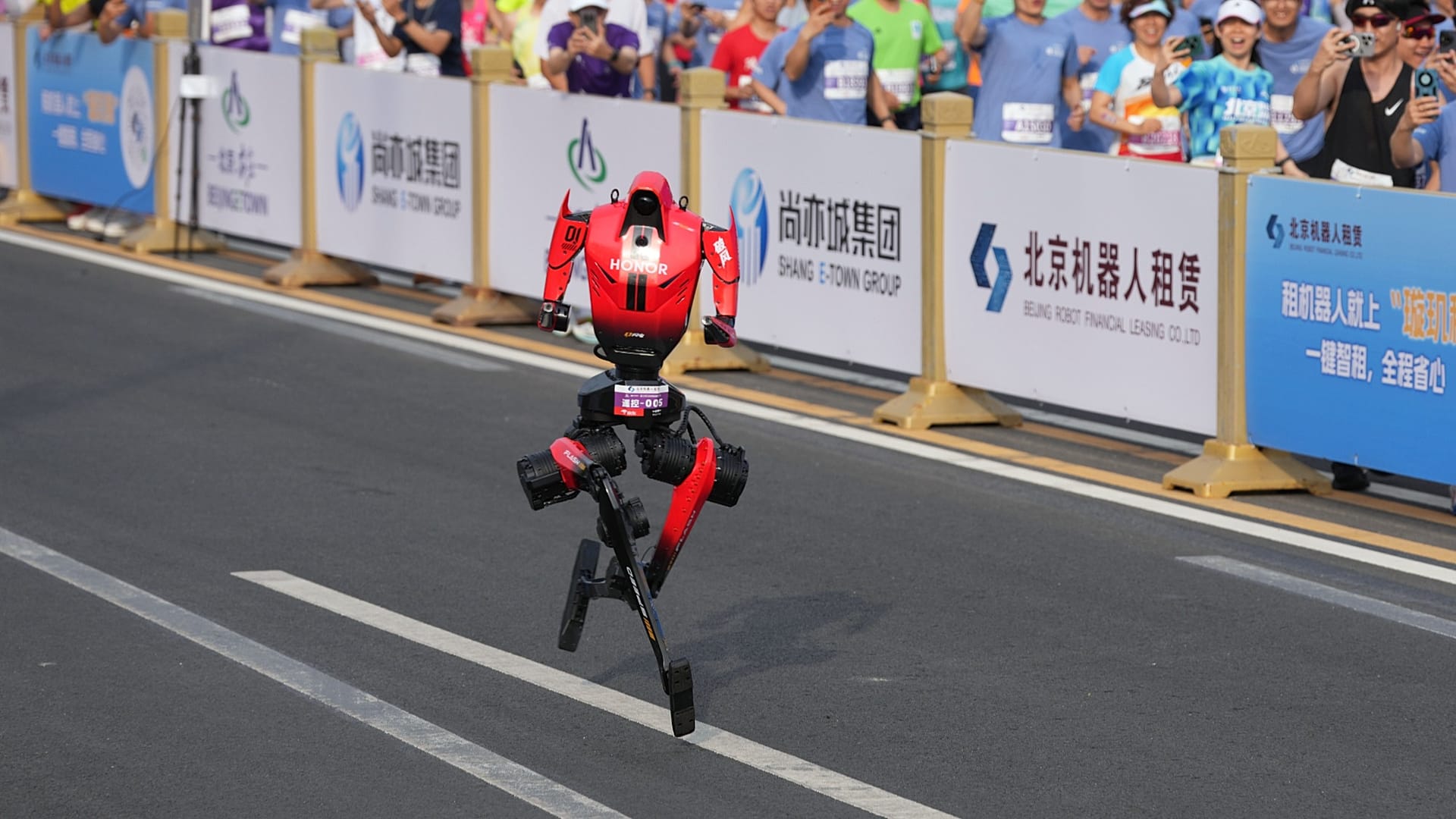 Humanoid robot smashes human half-marathon world record in Beijing race ...